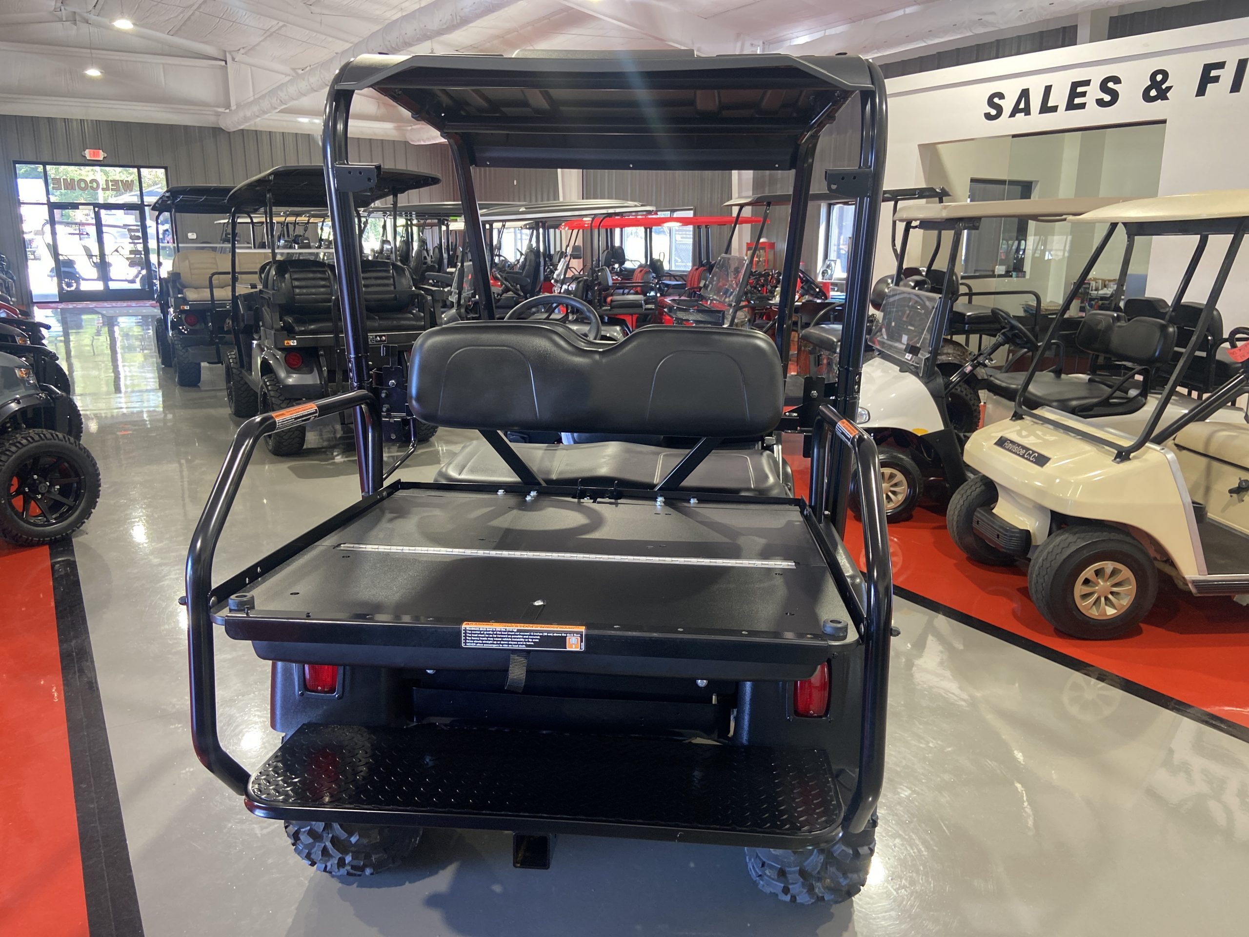 2025 EZGO EXPRESS™ 4×4 4-Passenger - Black - Macon Golf Carts